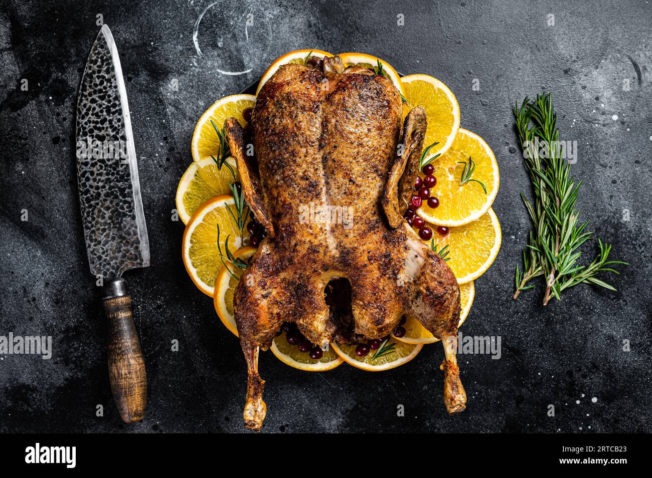 Christmas dinner, baked duck with rosemary and oranges, crispy whole ...