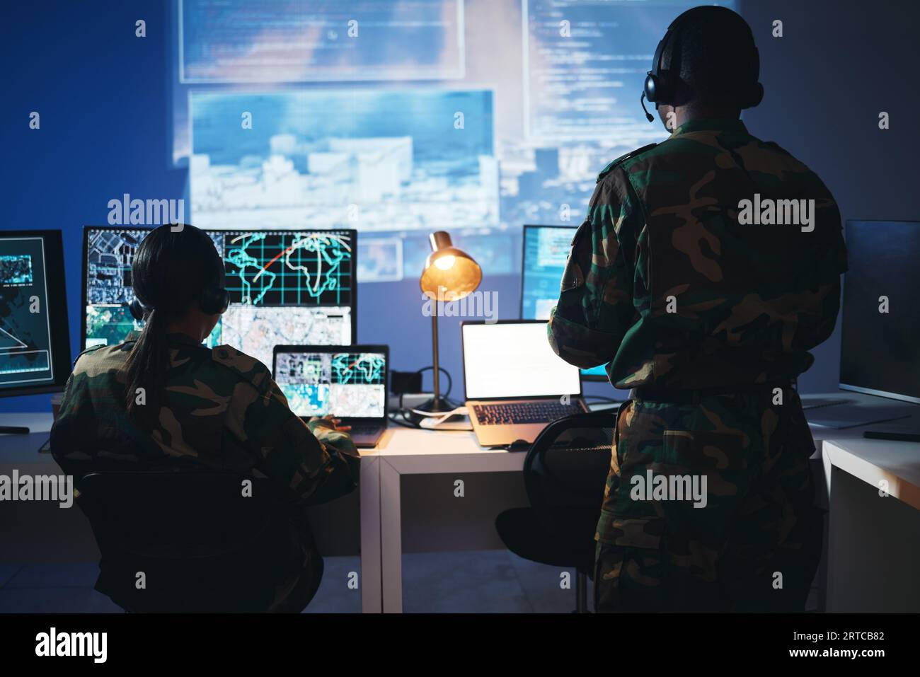 Control room, military and people on computer for surveillance, tracking operation and national ...