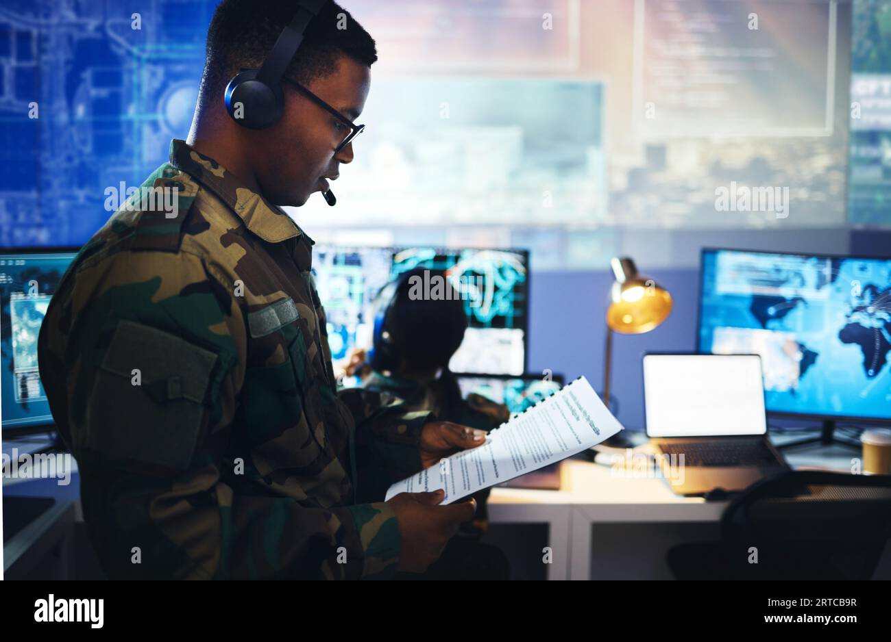 Control room, military documents and people on computer for ...