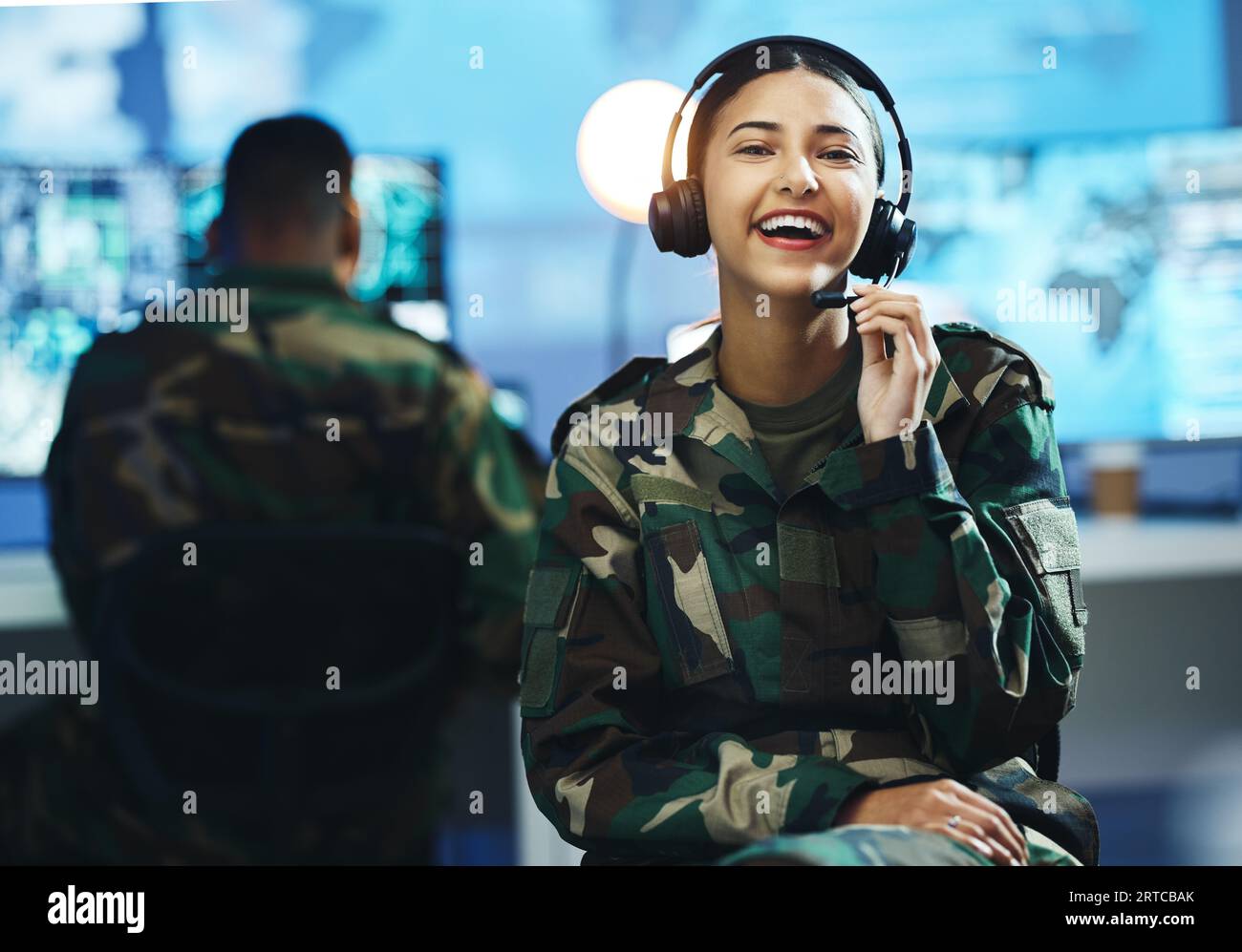 Portrait, headset and a woman in a military control room for strategy ...