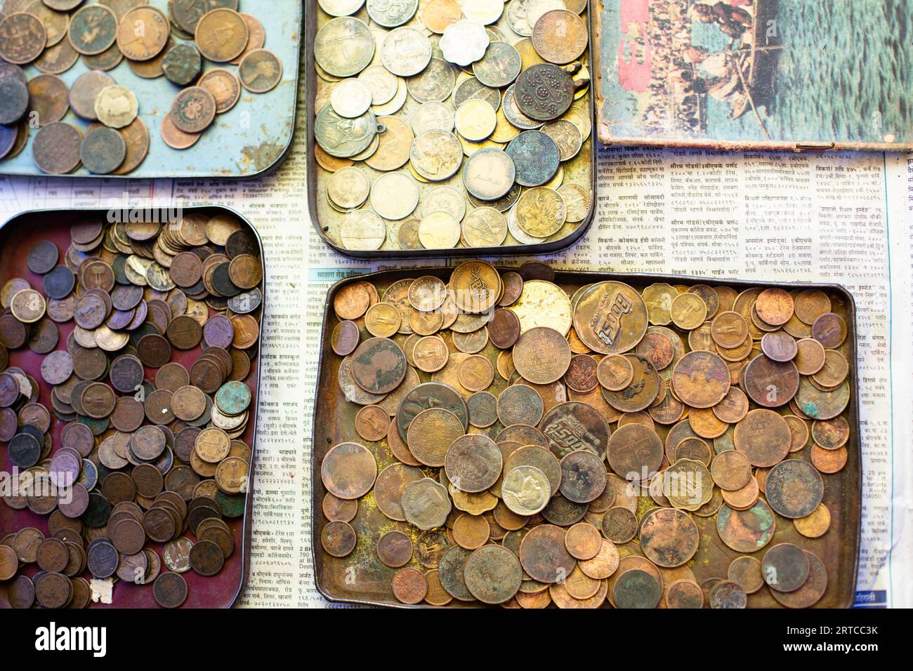 Pune, India, Old Indian artifacts, coins on old newspaper Stock Photo ...