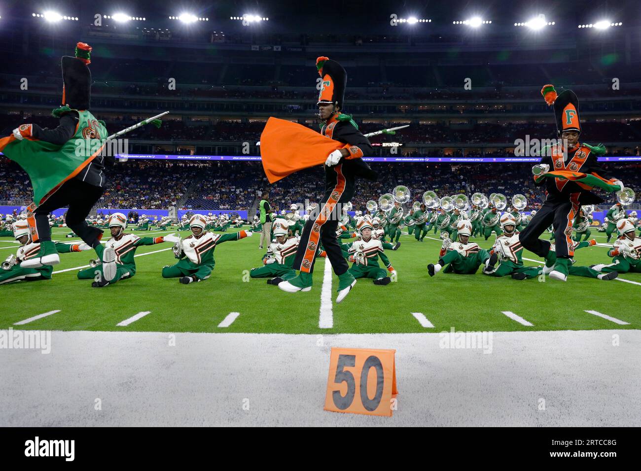 The drum majors lead the Florida A&M University Marching 100 band ...