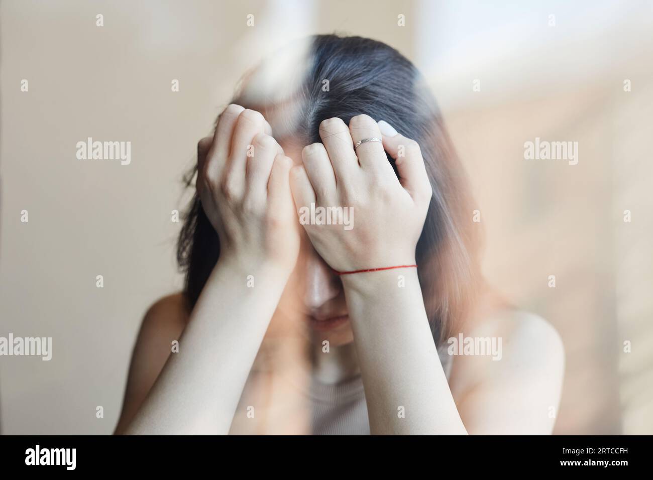 Distorted portrait of young woman struggling with mental health issues ...