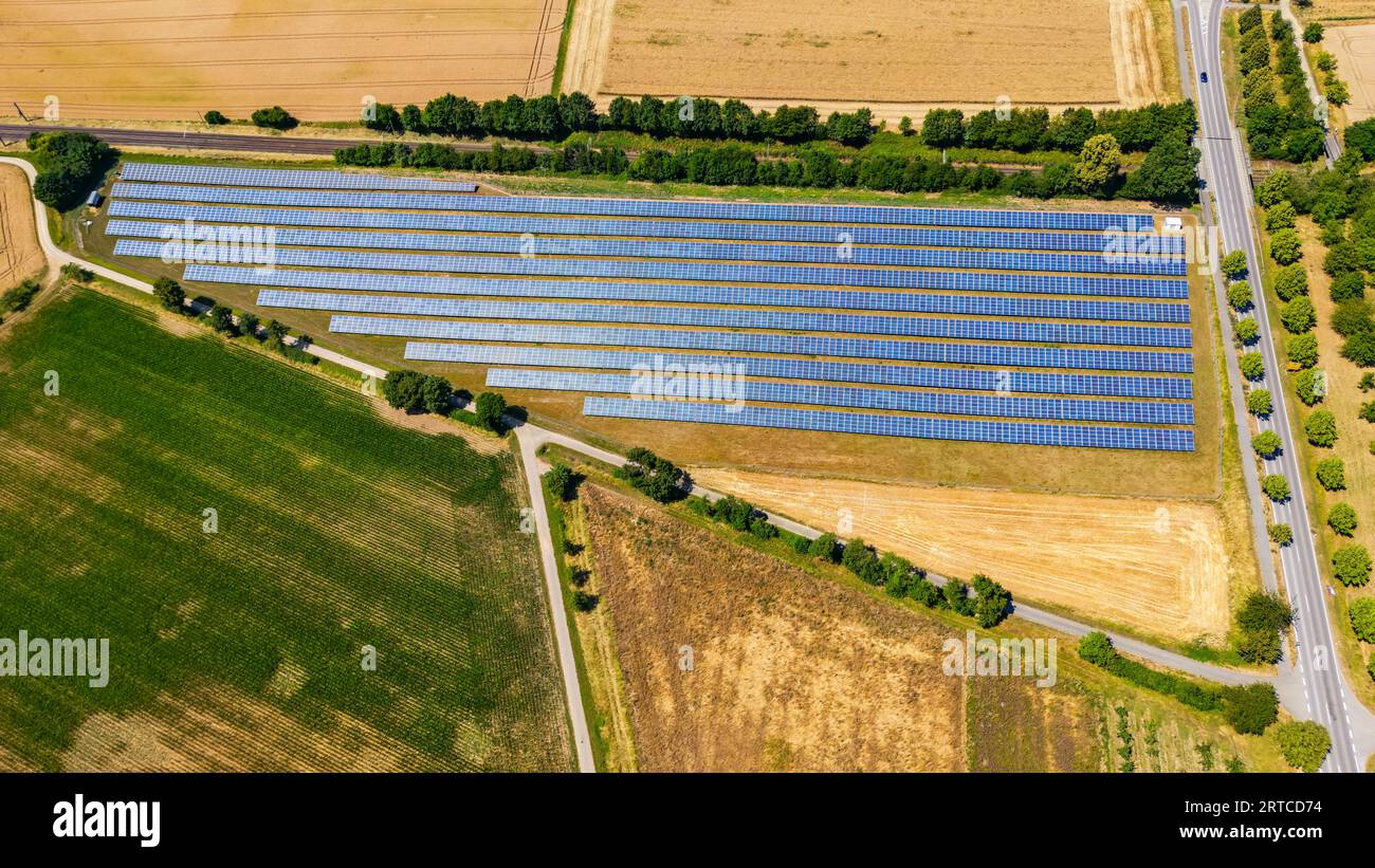 Aerial view of a ground-mounted system with photovoltaic modules next ...