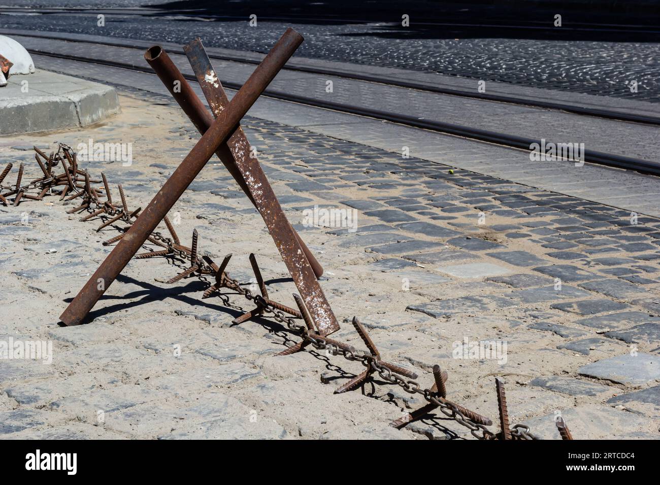 Iron hedgehog. Anti-tank barrier. Military industry. Block on the road ...