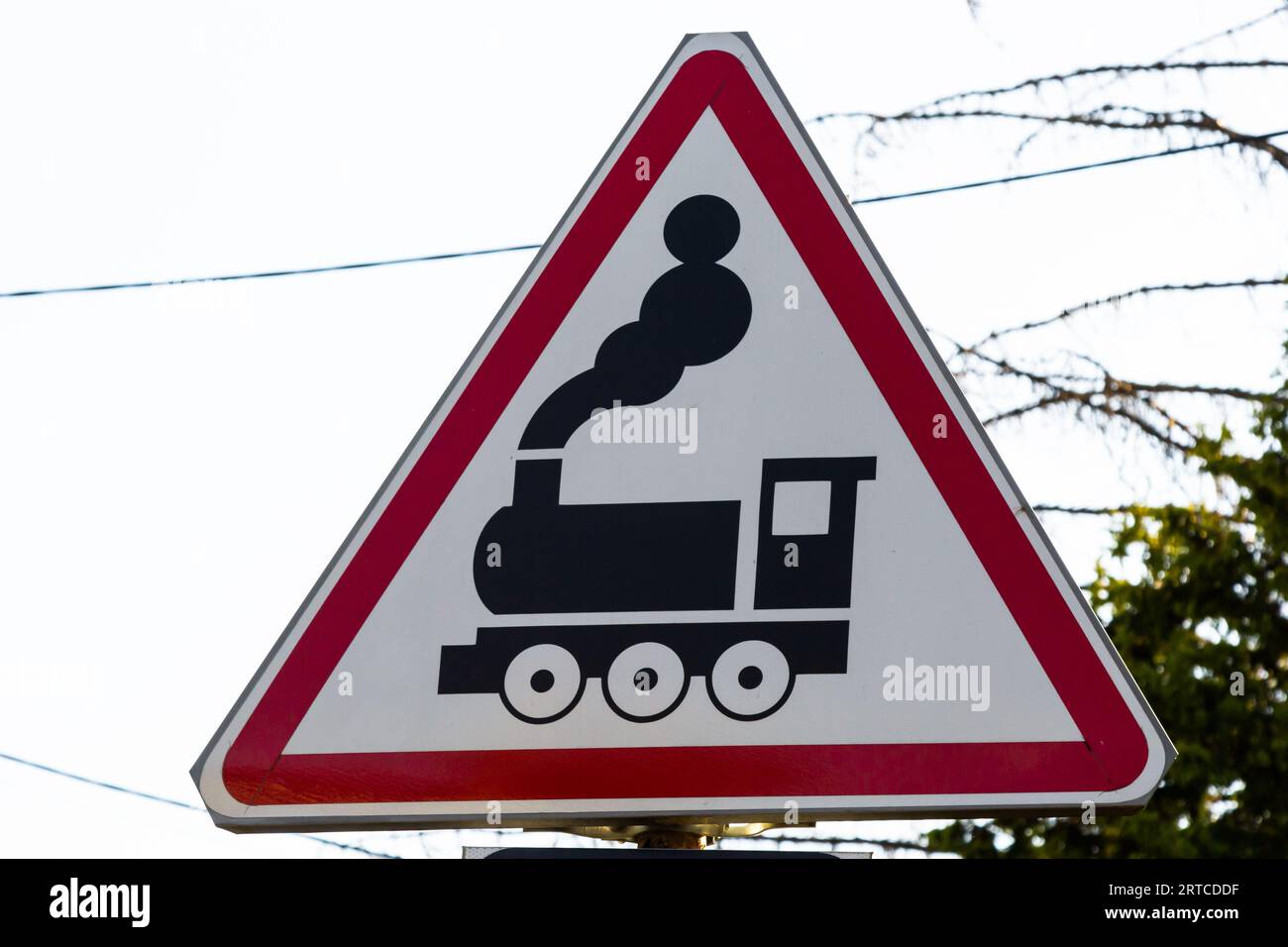 Railway road sign in red and white, railway crossing sign, in the ...