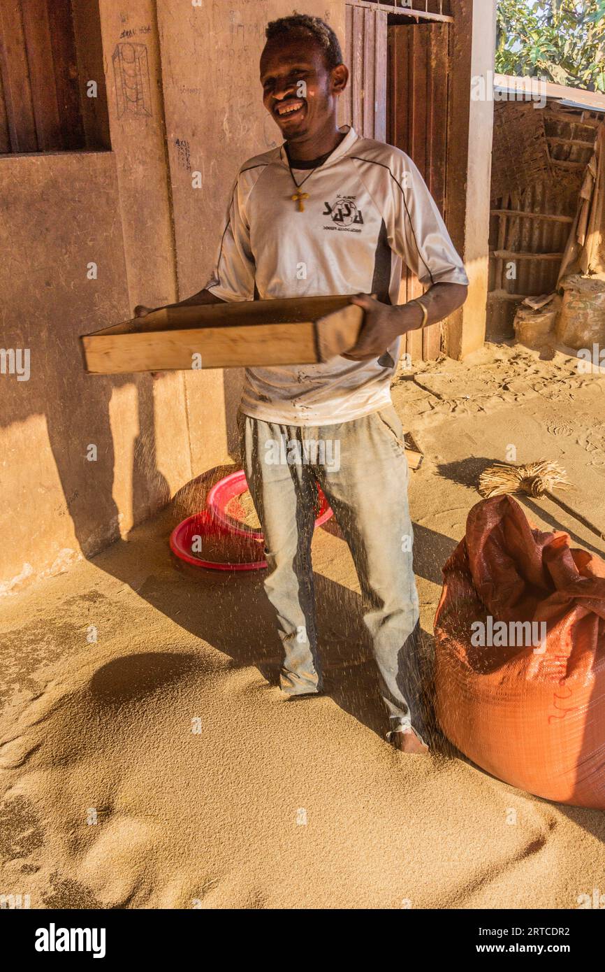 JINKA, ETHIOPIA - FEBRUARY 5, 2020: Teff grain seller in Jinka ...