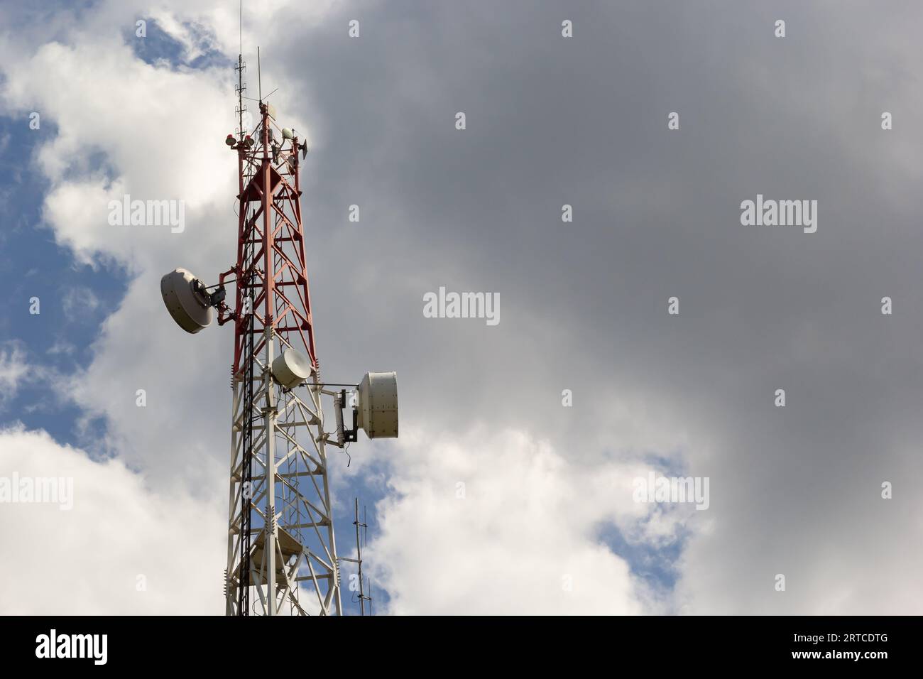 Telecommunication tower with radio, microwave and television antenna system located in the ...
