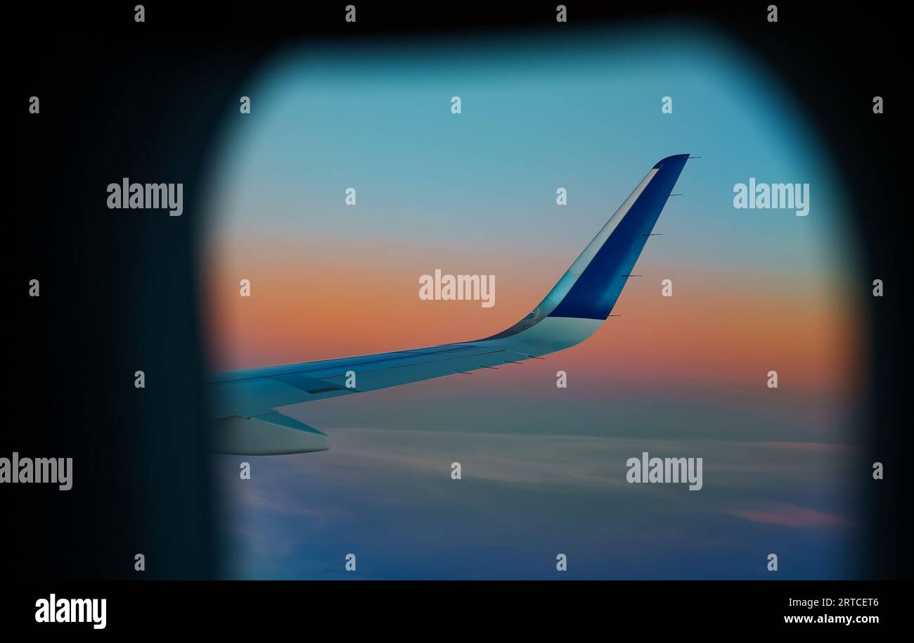 Wing of an airplane, view from window Stock Photo - Alamy