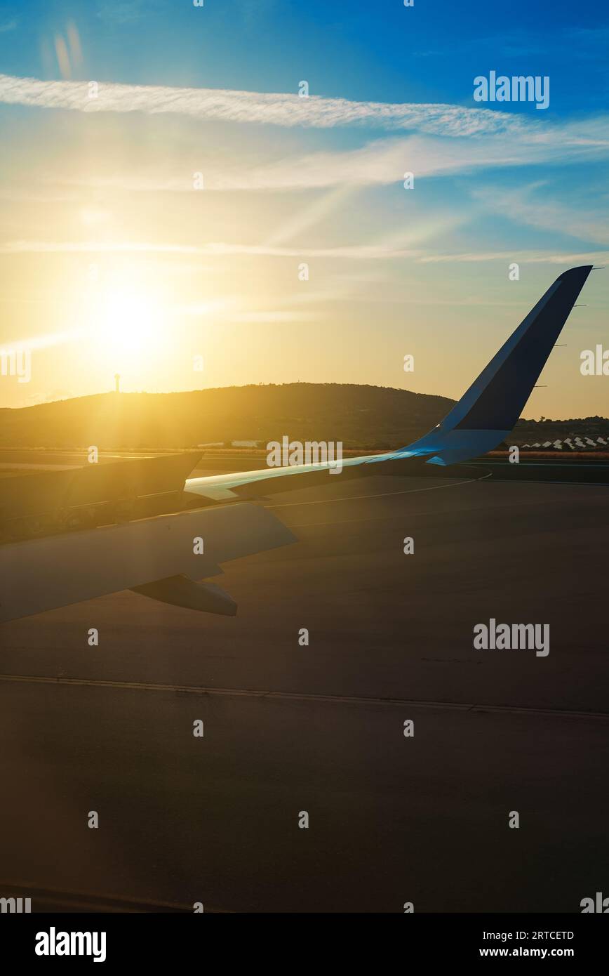The plane is taking off or landing. View from the window Stock Photo ...