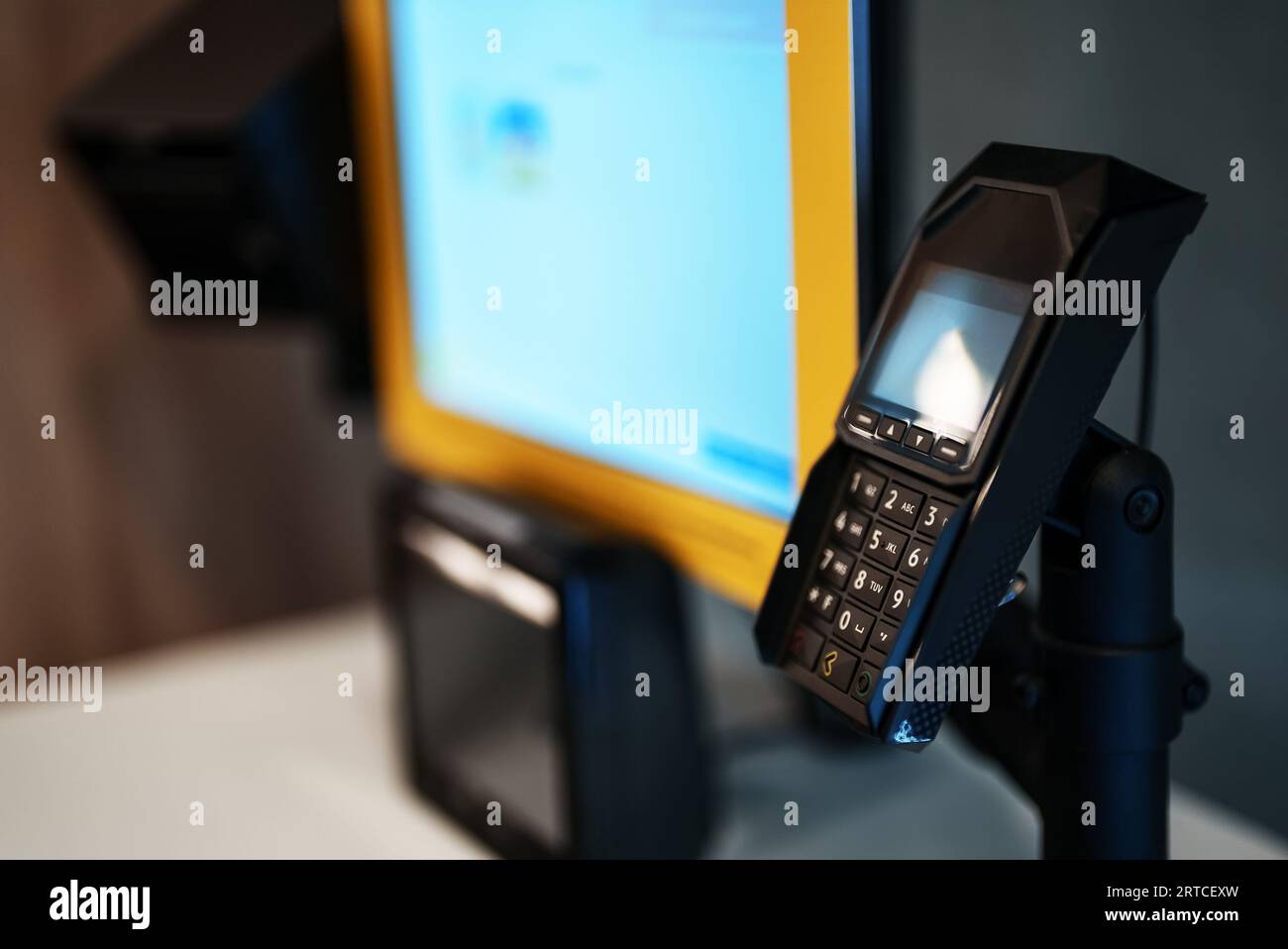 Self-service cash register with payment terminal Stock Photo - Alamy