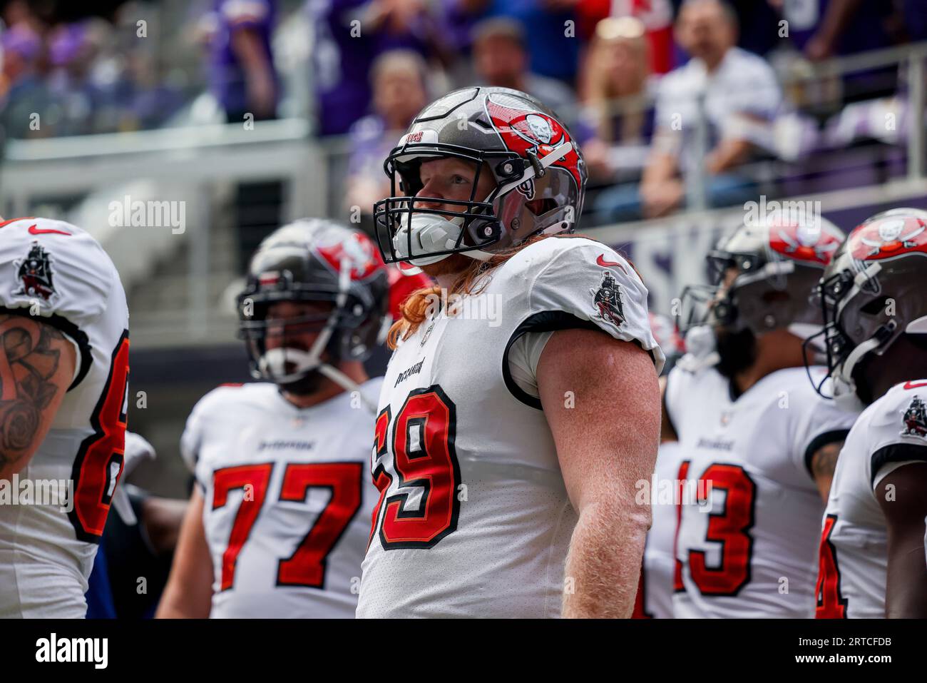 Tampa Bay Buccaneers guard Cody Mauch (69) stands with teammates during ...