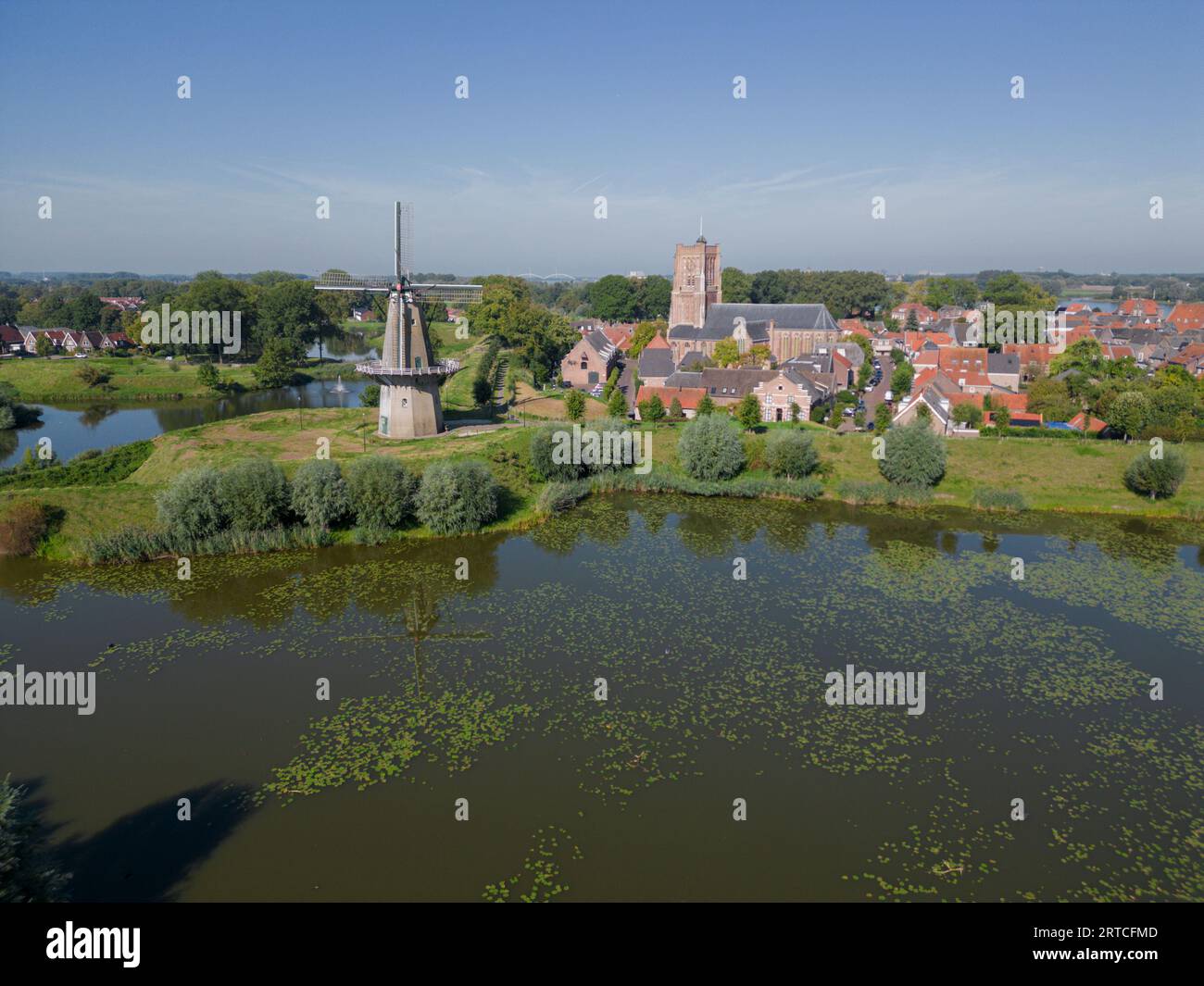 Aerial from the historical city Woudrichem at the river Merwede in the ...