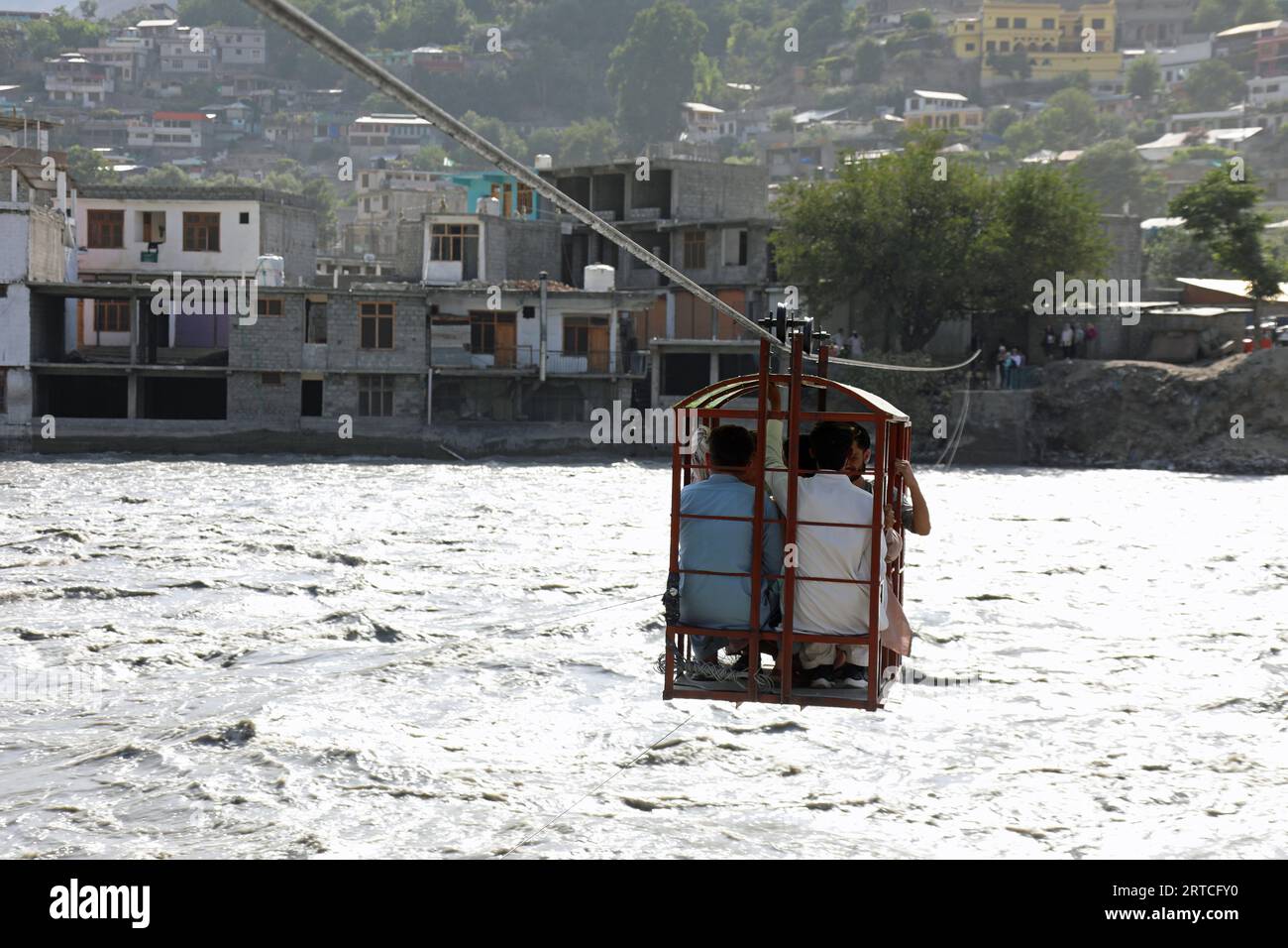 Cable car river crossing at Chitral in northern Pakistan Stock Photo ...