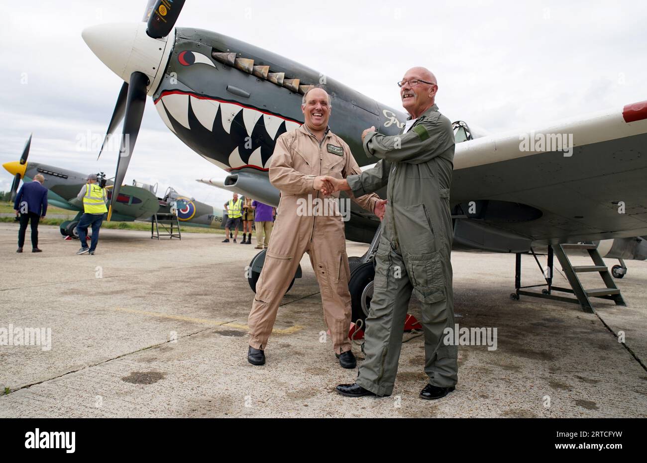 Chelsea pensioner Mike Smith (right) with pilot Jon Cooke after flying over Sussex in a Spitfire ...