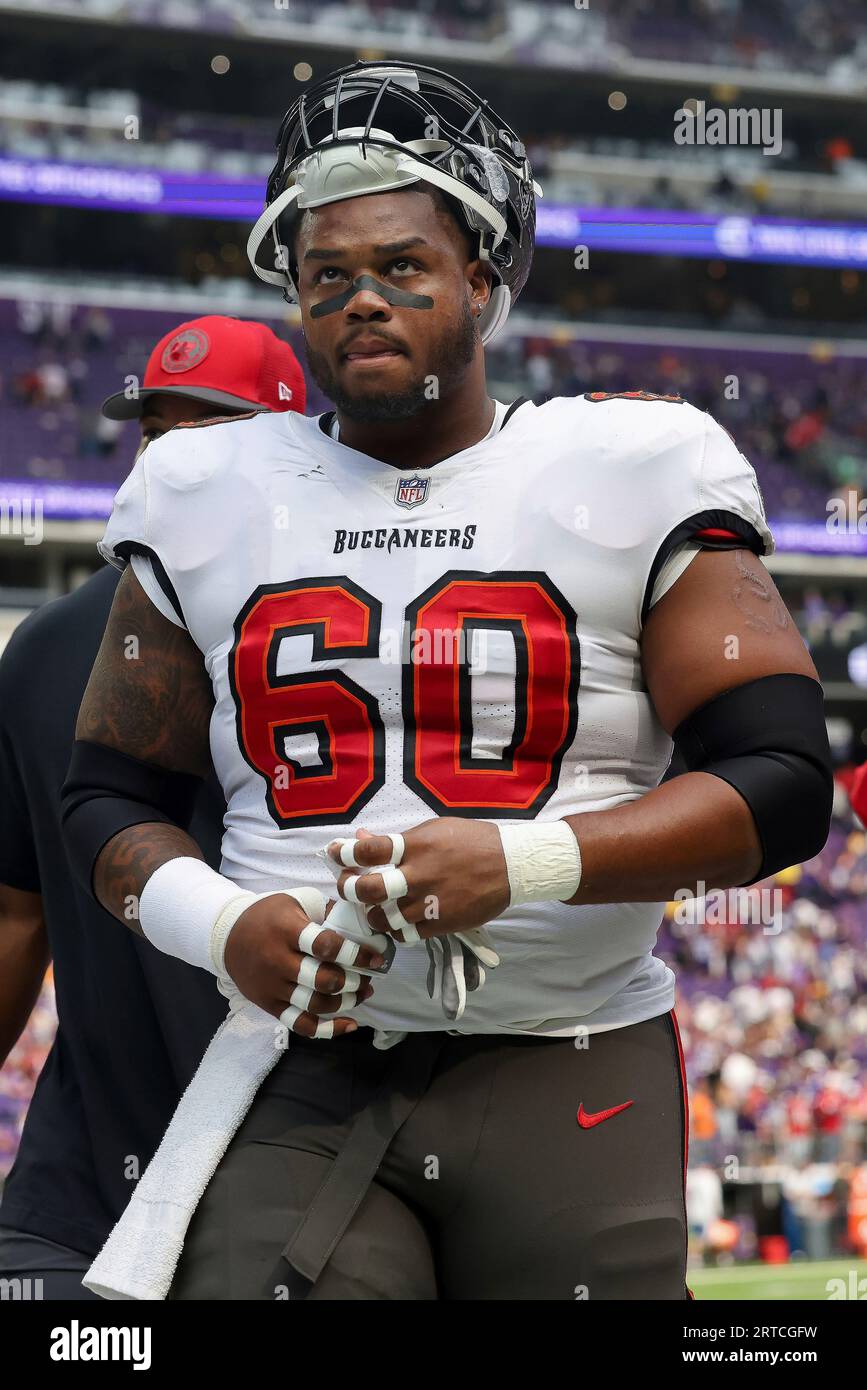 Tampa Bay Buccaneers guard Nick Leverett (60) leaves the field after an ...