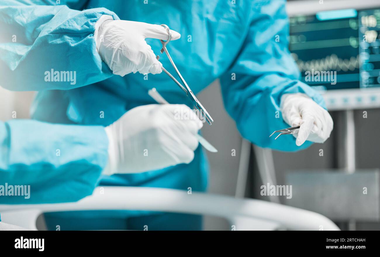 Surgery, hands on tools and doctor in cutting thread with scissors ...