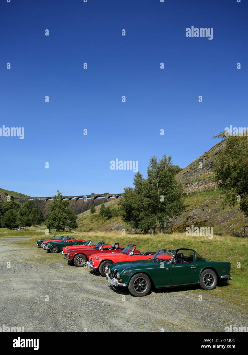 Classic Triumph TR sports cars parked in the Elan valley, Powys, Wales ...