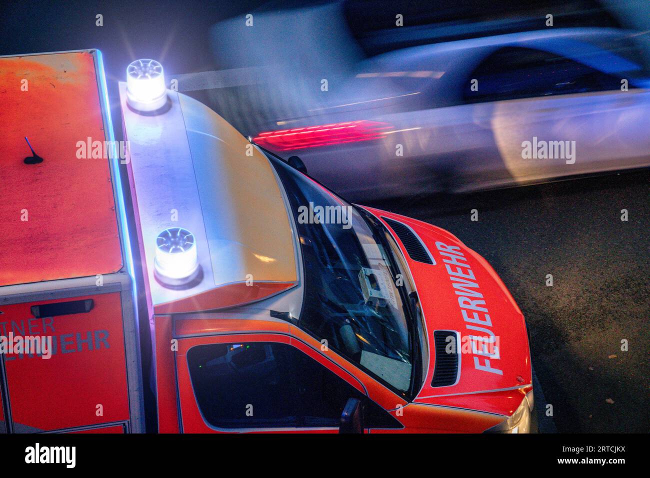 Emergency doctor, ambulance, fire brigade, emergency drive with blue ...