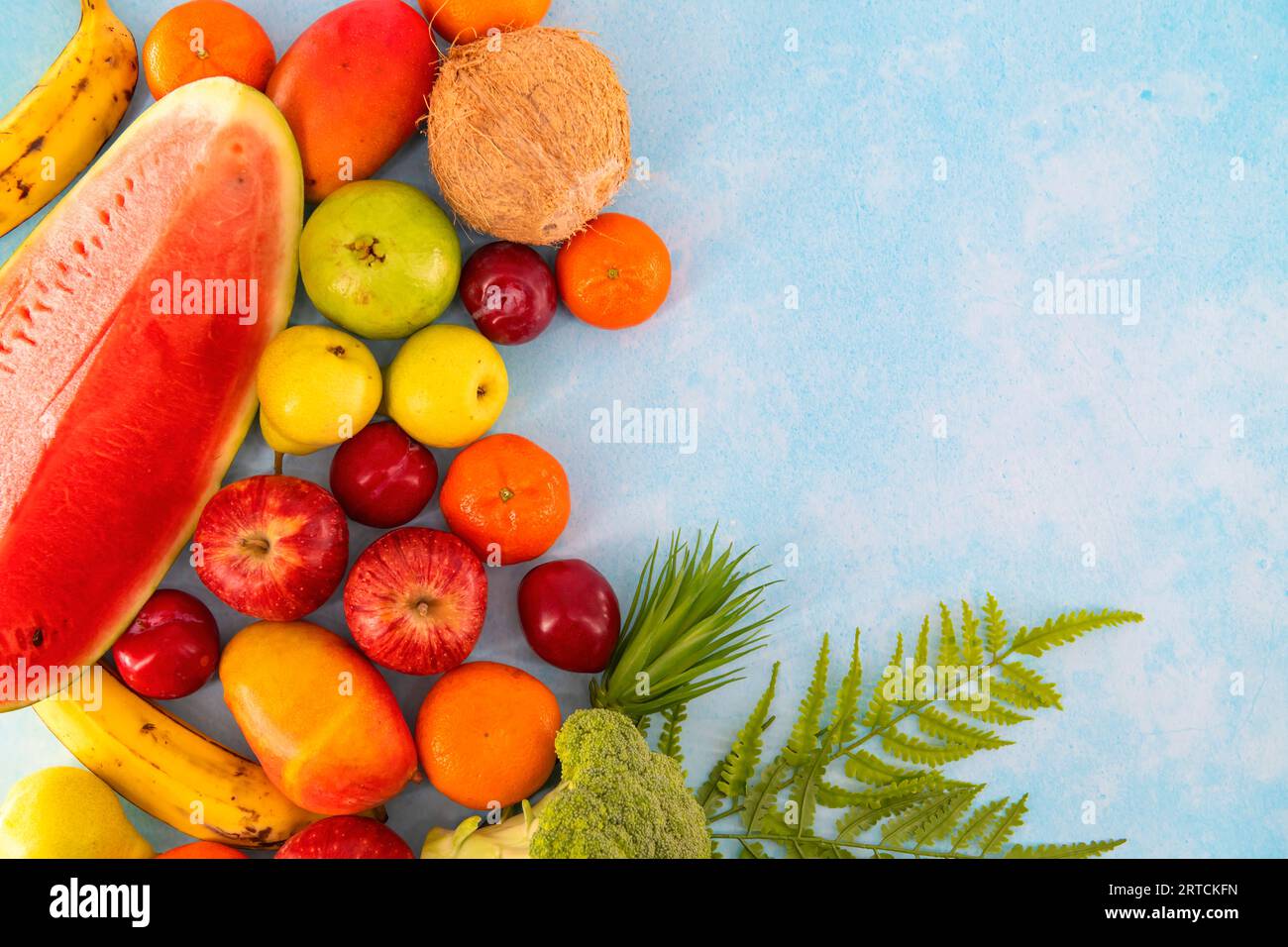 Healthy organic food background. Studio photo of different fruits and ...