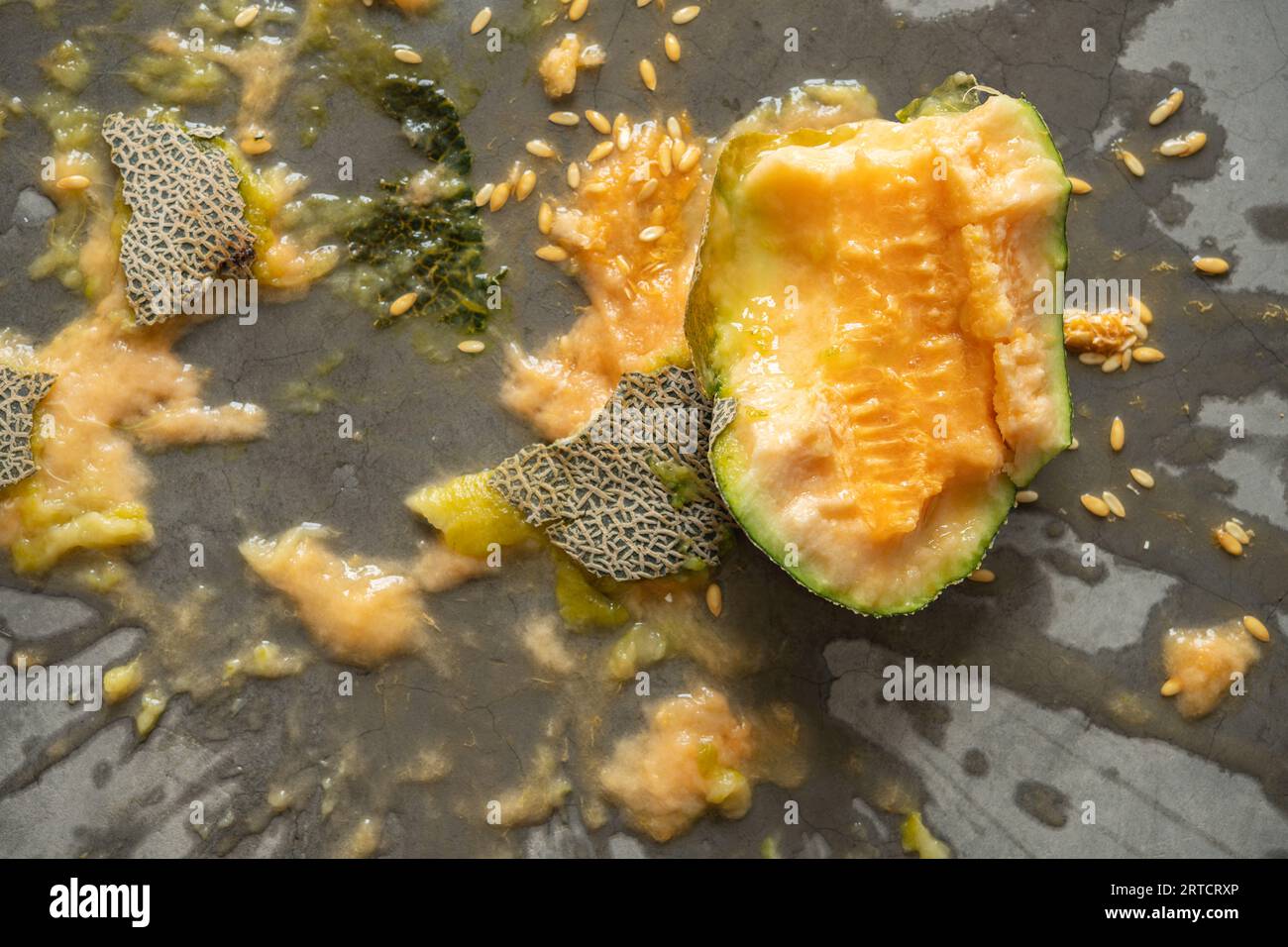 top view broken hami melon on the ground horizontal composition Stock ...