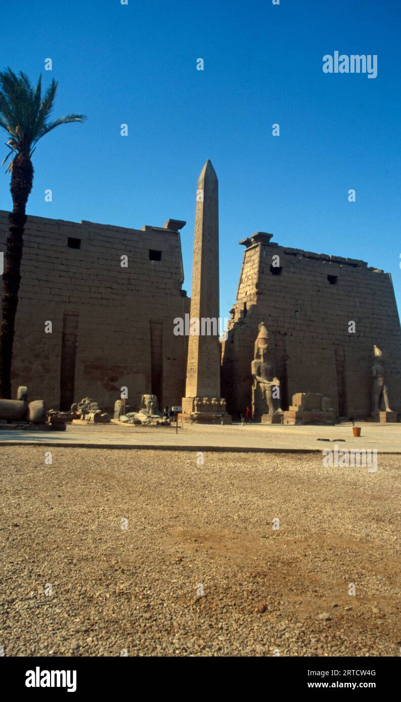Pylon and statues of Ramesses 2nd at the entrance to Luxor Temple Luxor ...