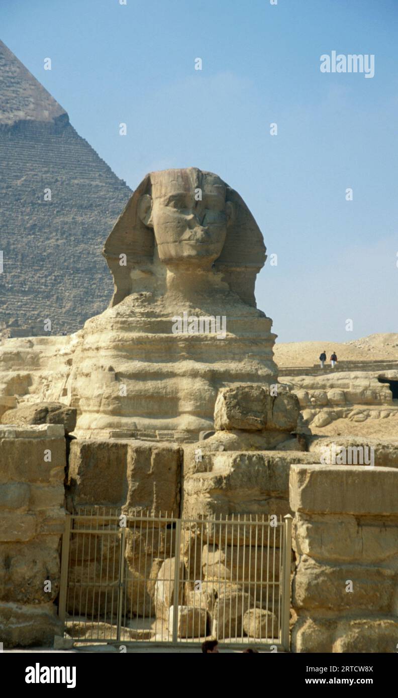 The Great Sphinx of Giza framed by the Great Pyramid of Khufu in the ...
