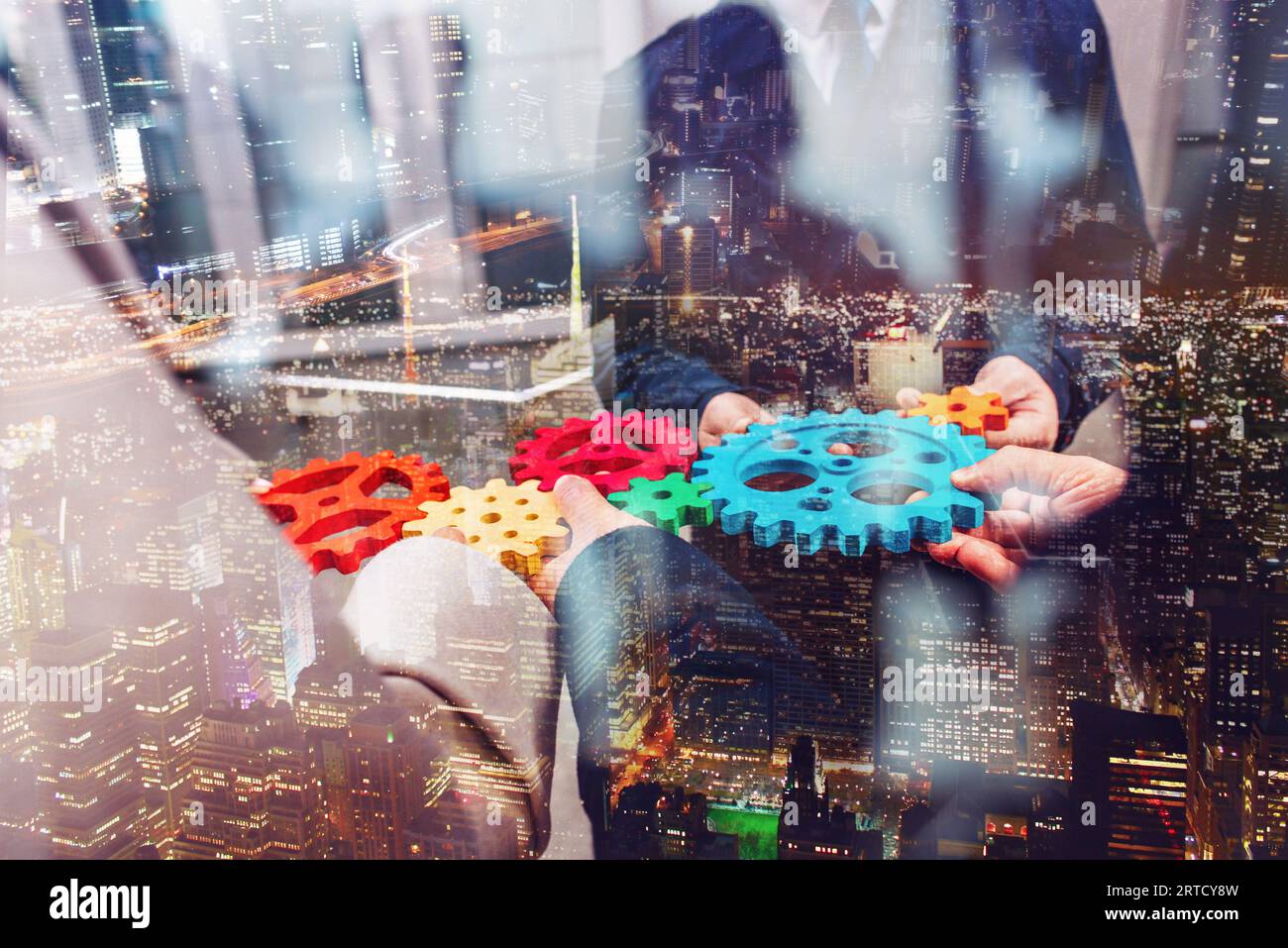 Business team work together and combine pieces of gears. Partnership ...