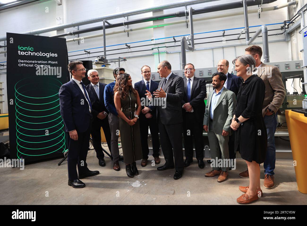 Lord Dominic Johnson, (centre) the UK's investment minister, who is in ...