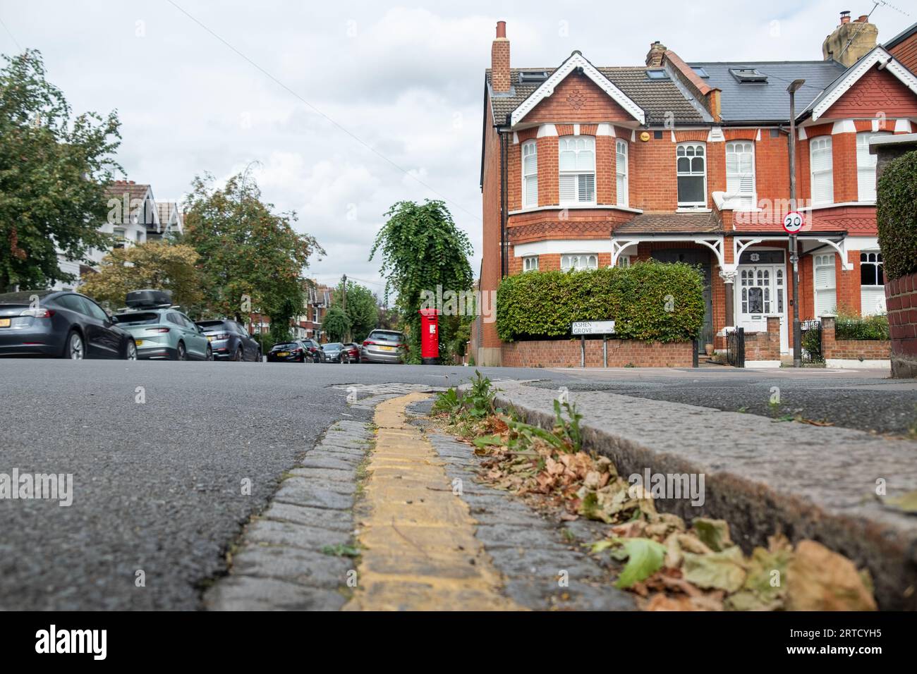 Street of typical British residential family terrace houses in south ...
