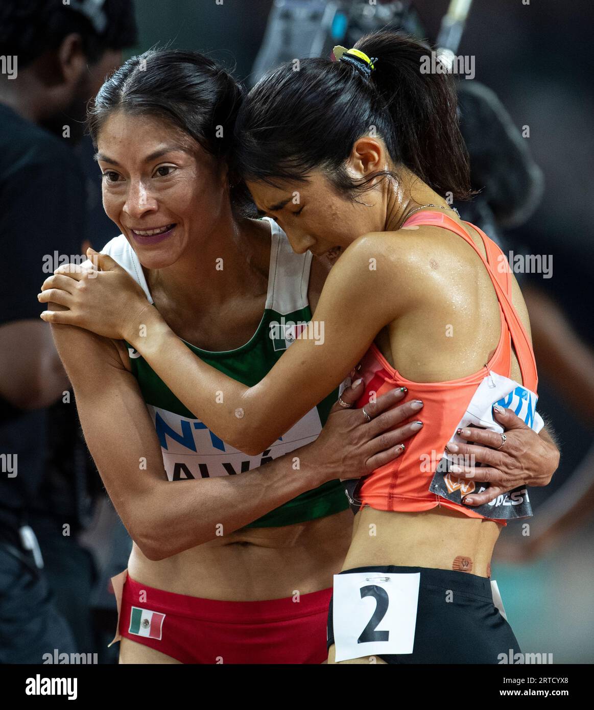 Laura Galván of Mexico and Nozomi Tanaka of Japan have a hug after ...