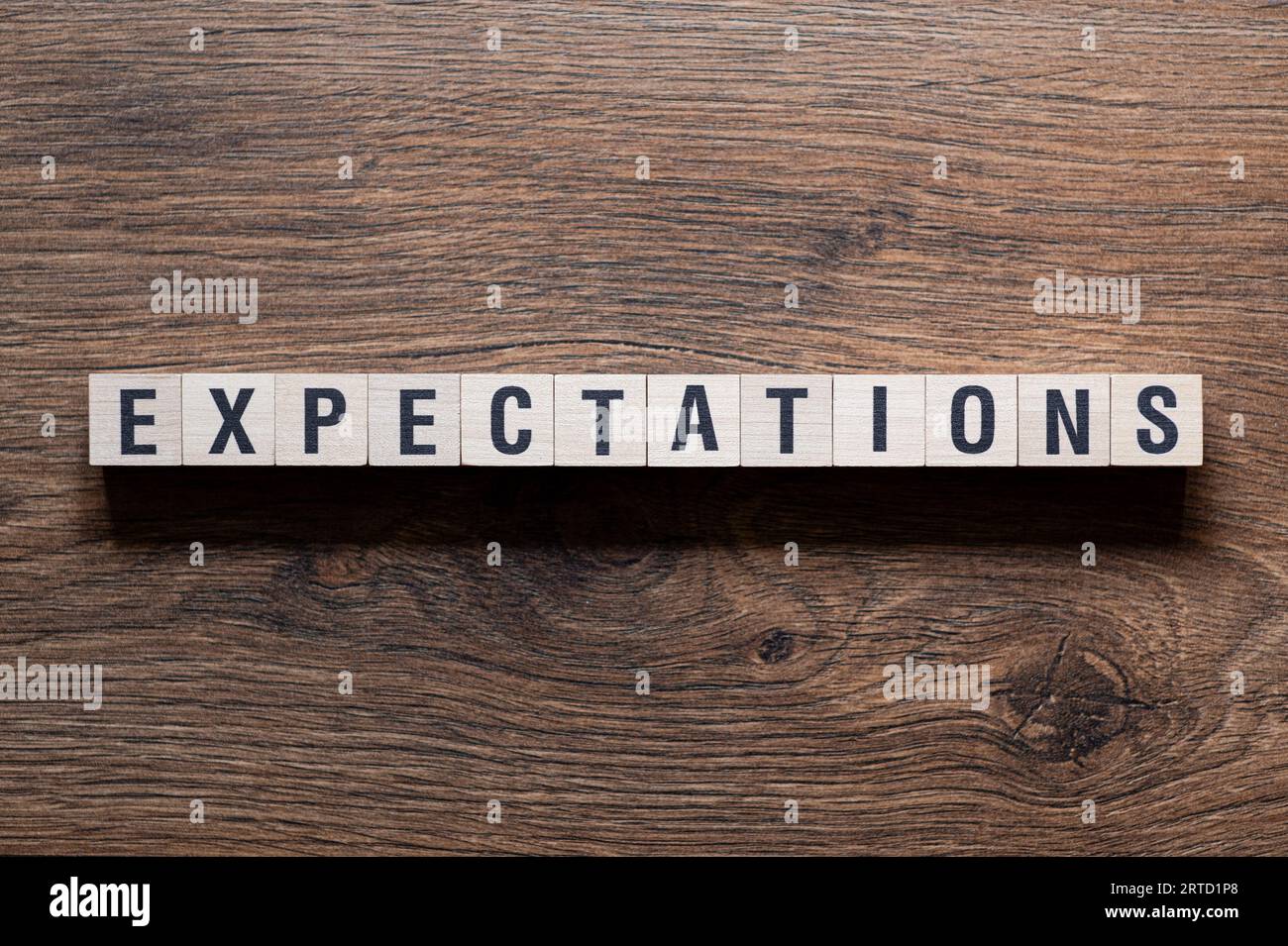 Expectations - word concept on building blocks, text Stock Photo - Alamy