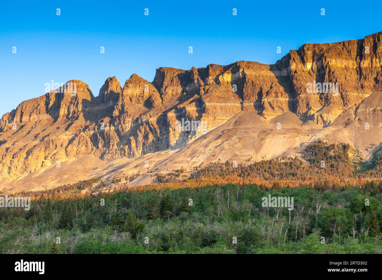 Sunrise at East Flattop Mountain , 8,356 feet, is located in the Lewis ...