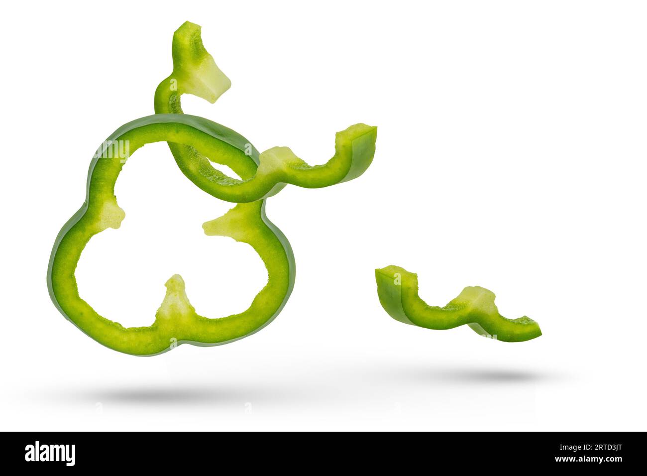 Set of green paprika cloves on a white isolated background close-up ...