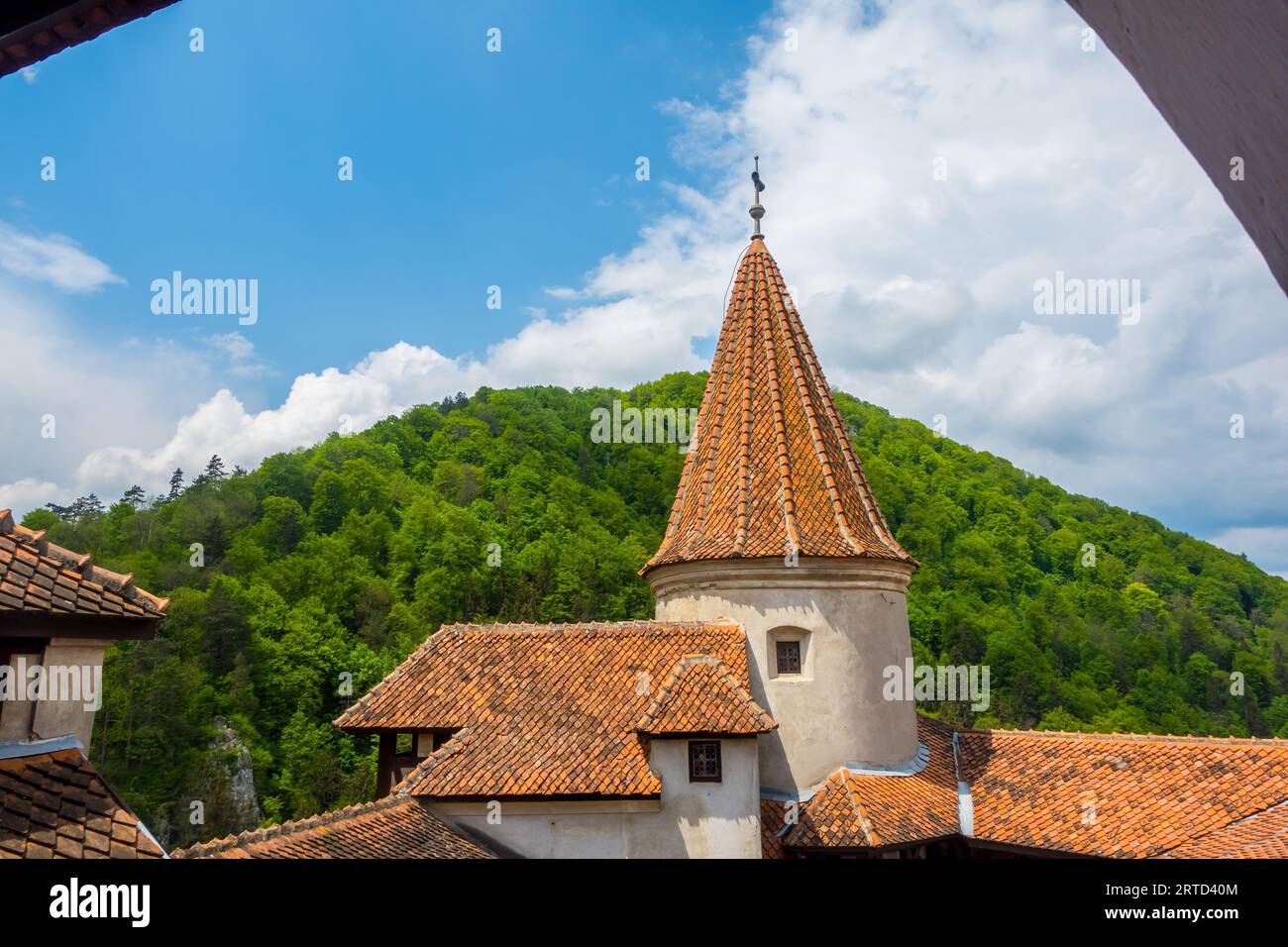 A picturesque architectural scene with a red-tiled roofed building ...