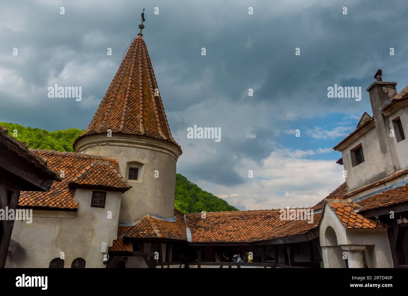 A picturesque architectural scene with a red-tiled roofed building ...