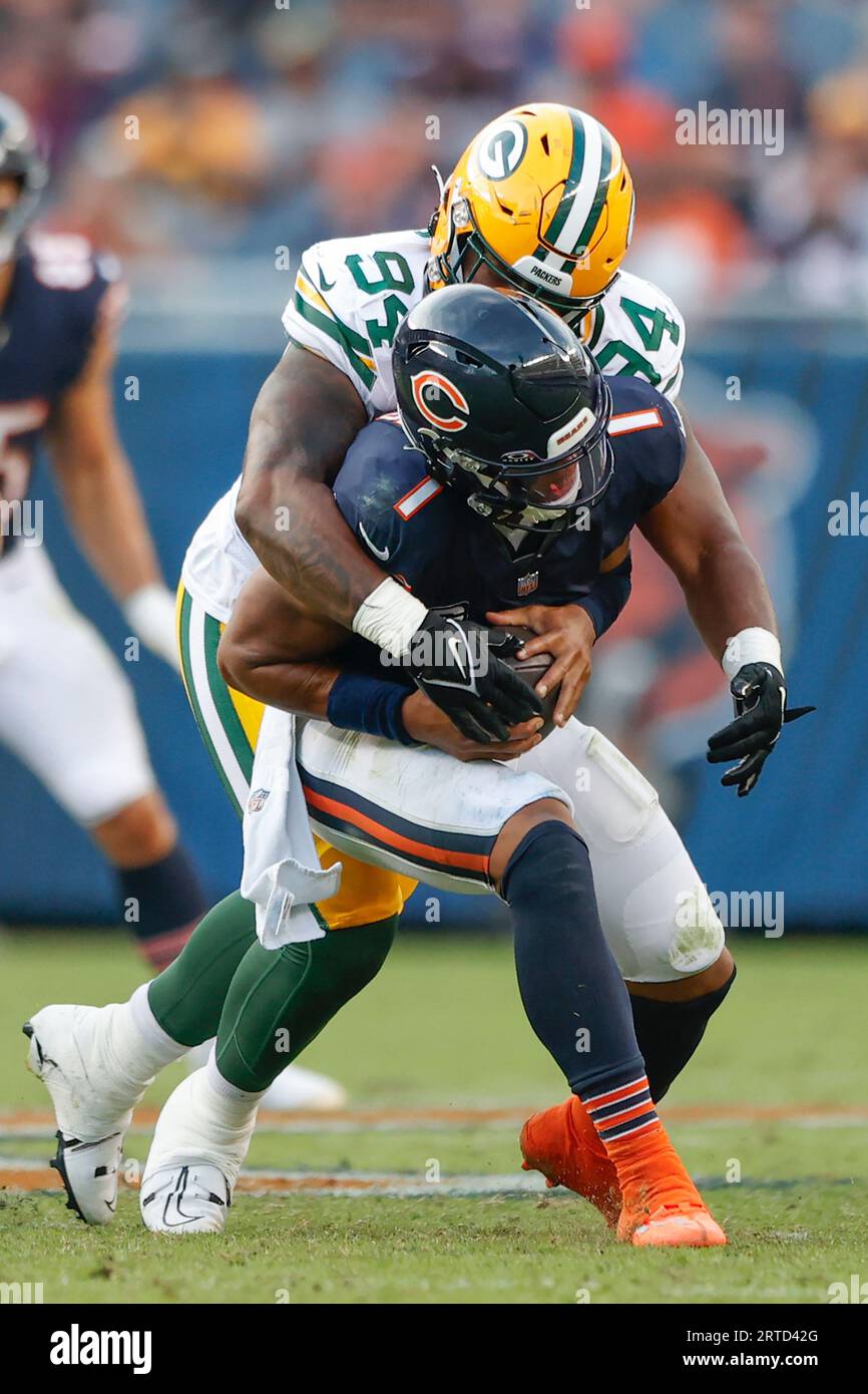Chicago Bears quarterback Justin Fields (1) is tackled by Green Bay ...