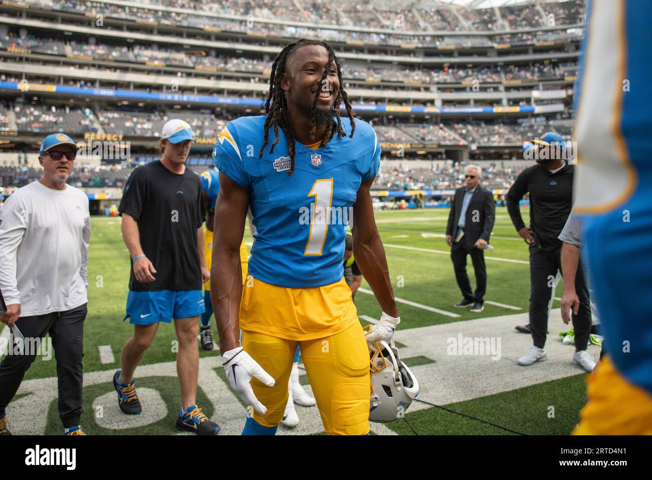 Los Angeles Chargers wide receiver Quentin Johnston (1) walks back to ...