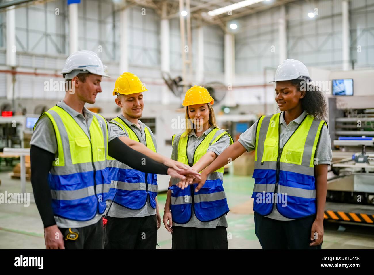 Group of smiling worker standing together at logistic distribution ...