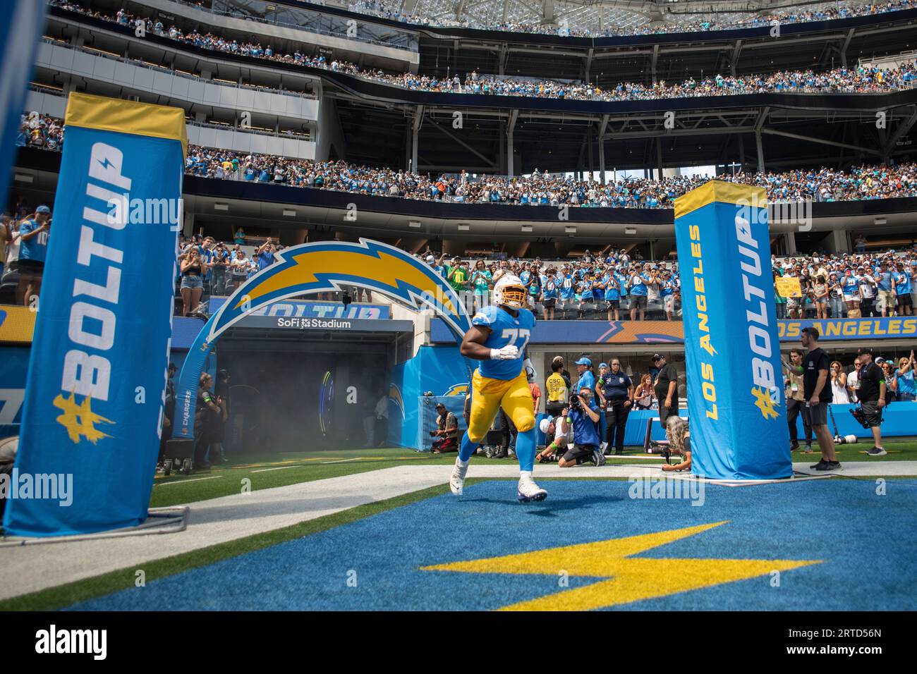Los Angeles Chargers guard Zion Johnson (77) enters the field before an ...