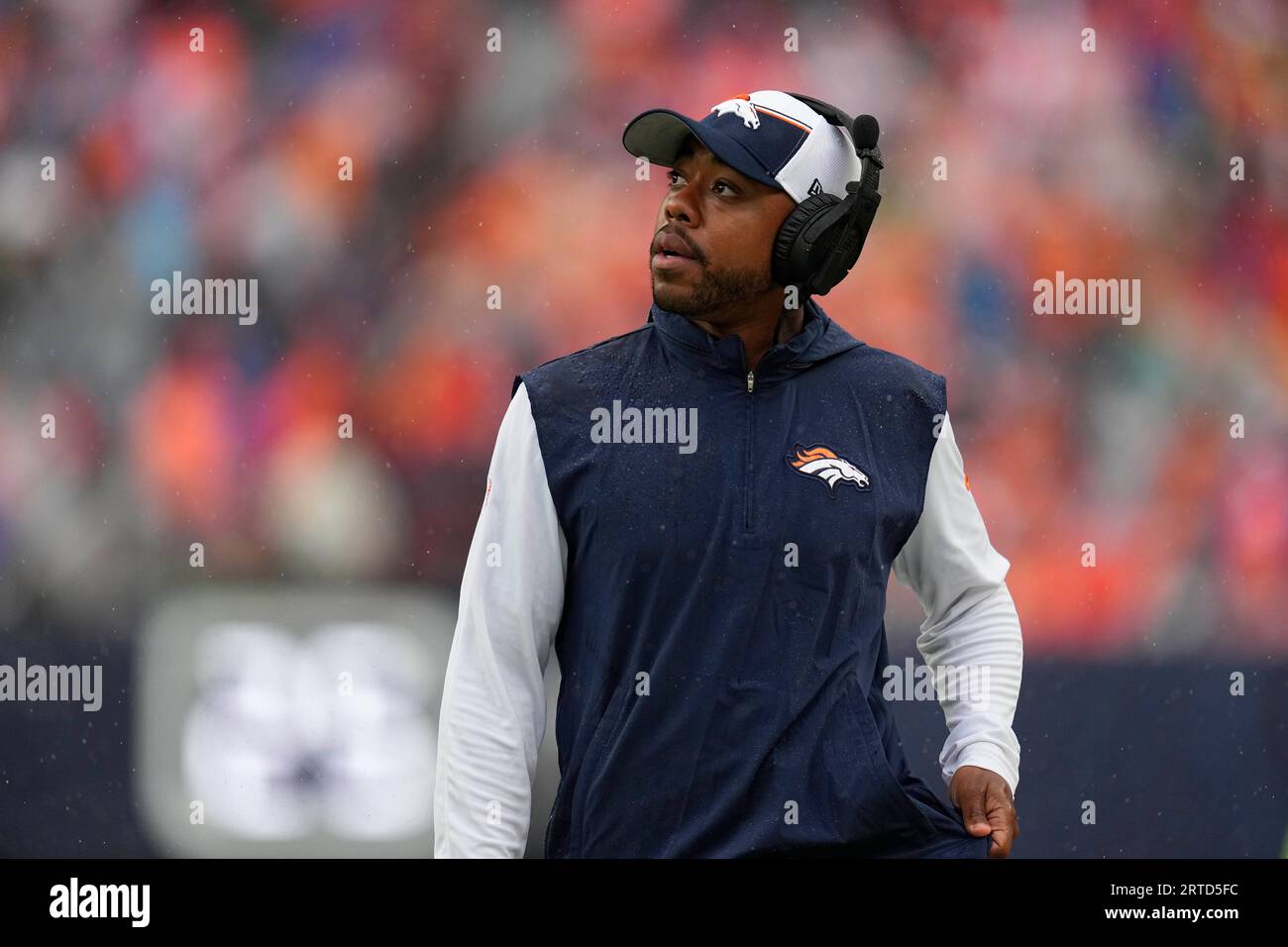 Denver Broncos defensive back coach Christian Parker looks on against ...