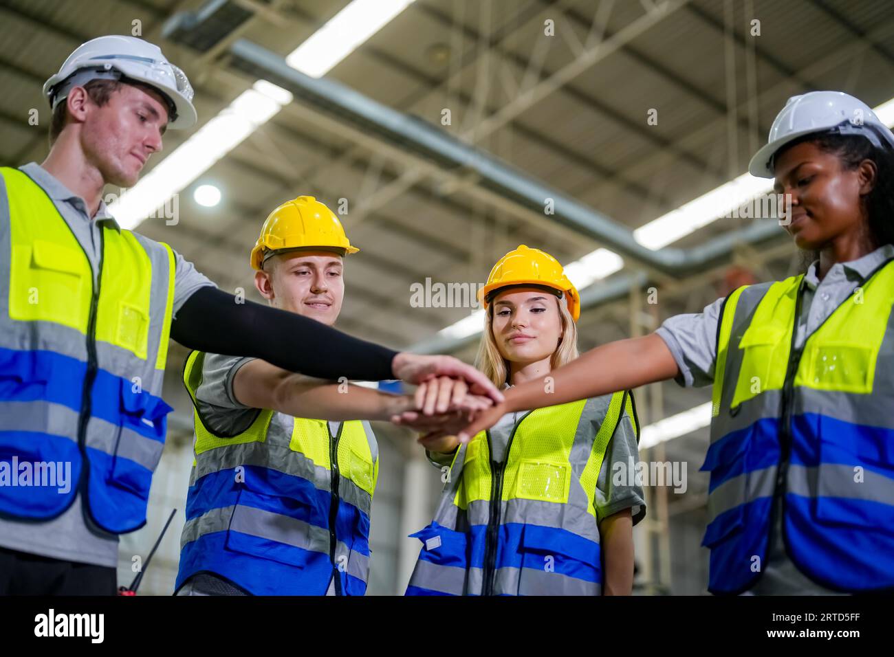 Group of smiling worker standing together at logistic distribution ...