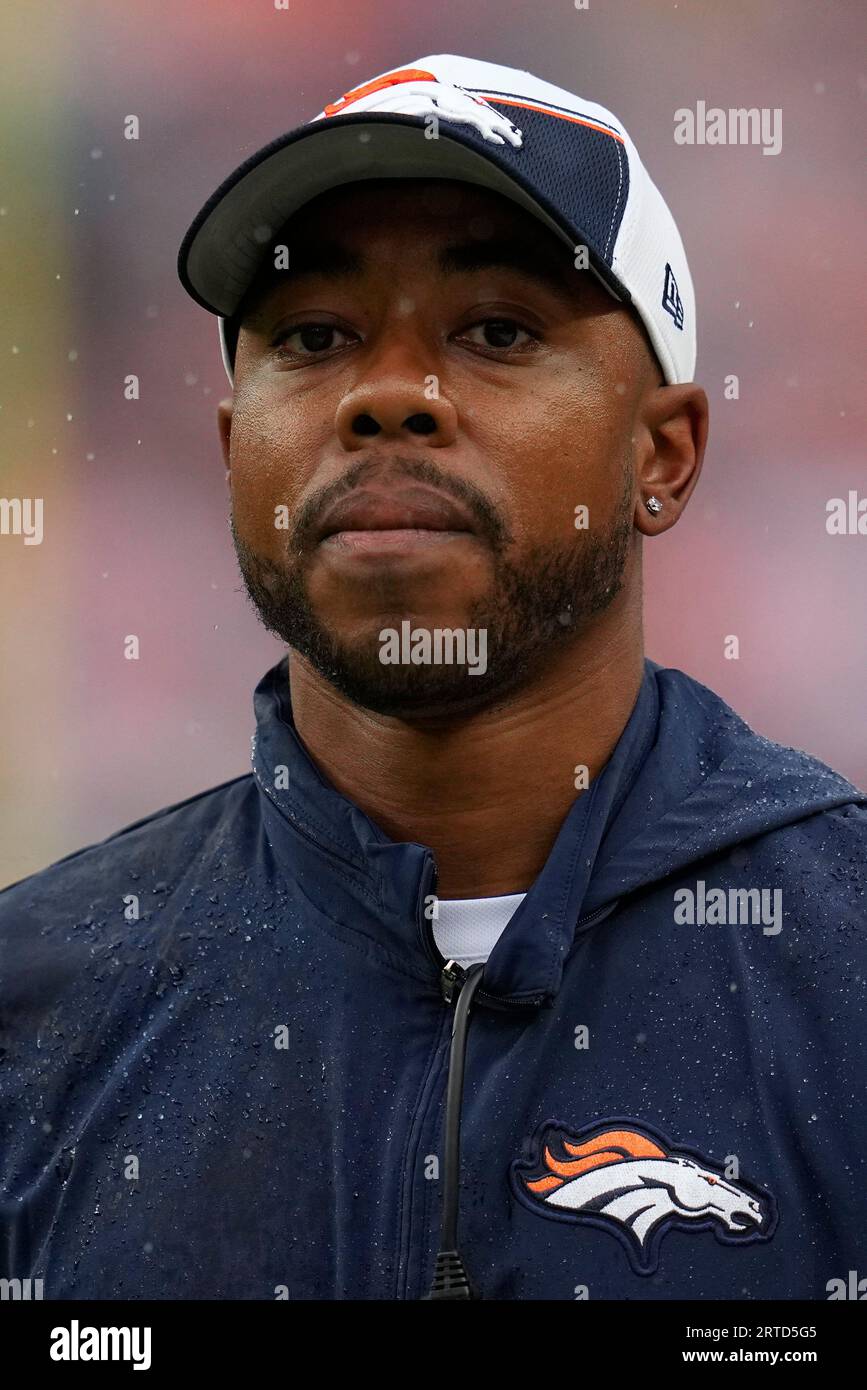 Denver Broncos defensive back coach Christian Parker looks on against ...