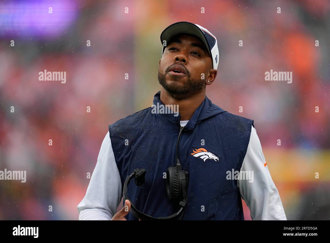 Denver Broncos defensive back coach Christian Parker looks on against ...