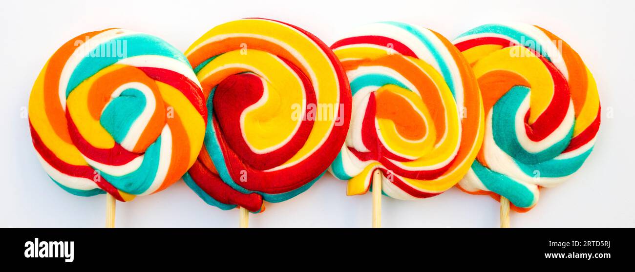 Colorful spiral lollipop candy . On a white background Stock Photo - Alamy