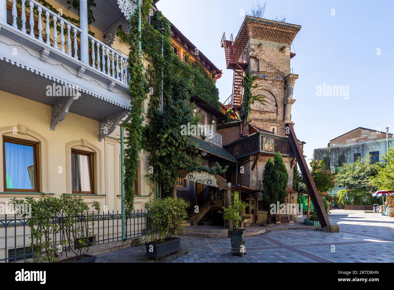 The disheveled clock tower of Gabriadze Puppet Theater is built from ...