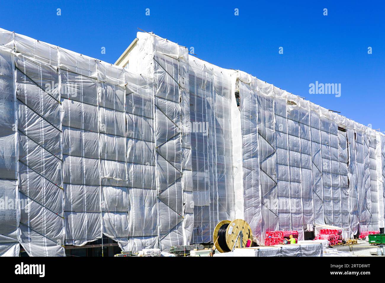 Insulation works of the facade of multistorey residential building ...