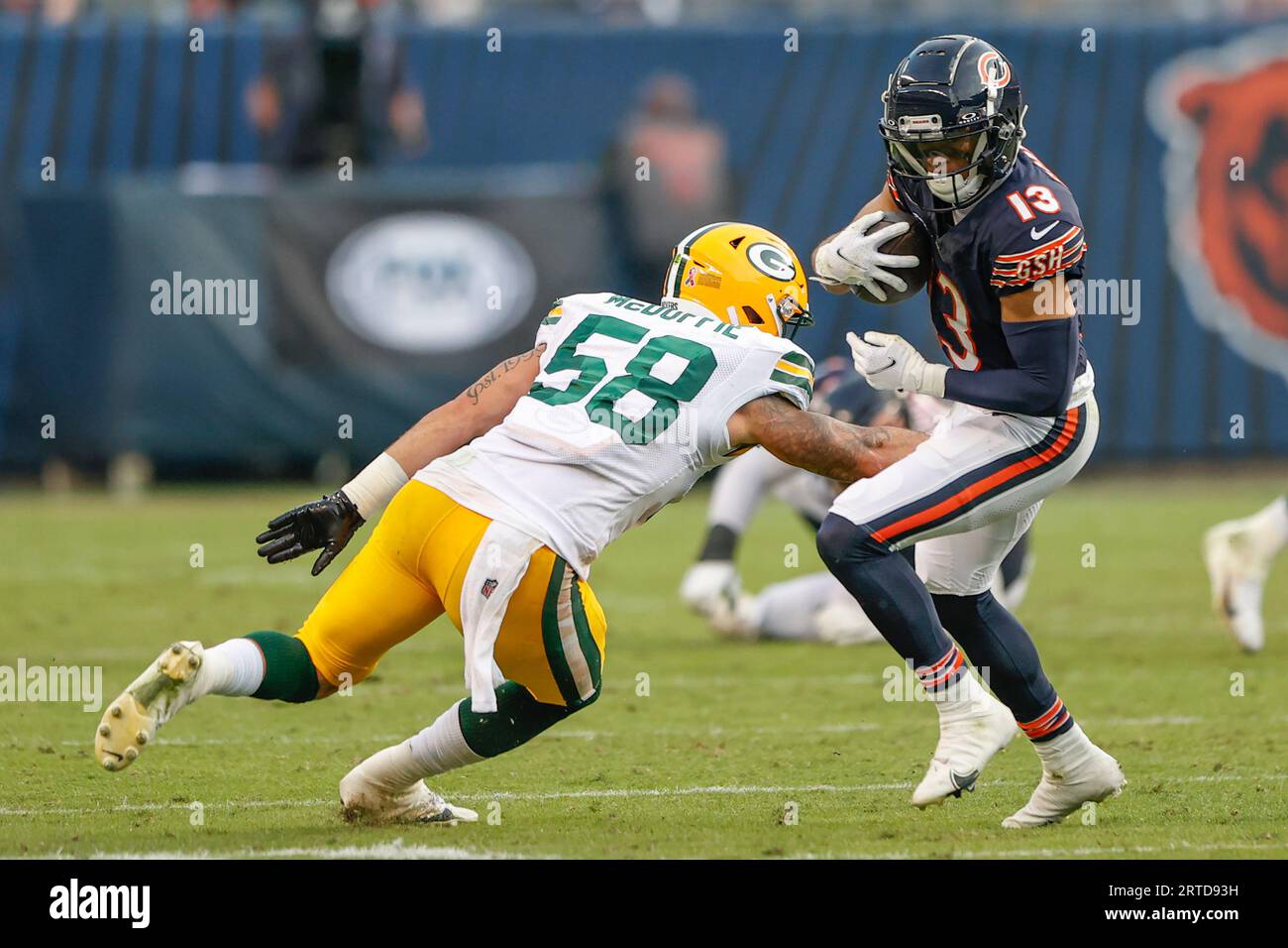 Chicago Bears wide receiver Tyler Scott (13) is defended by Green Bay ...