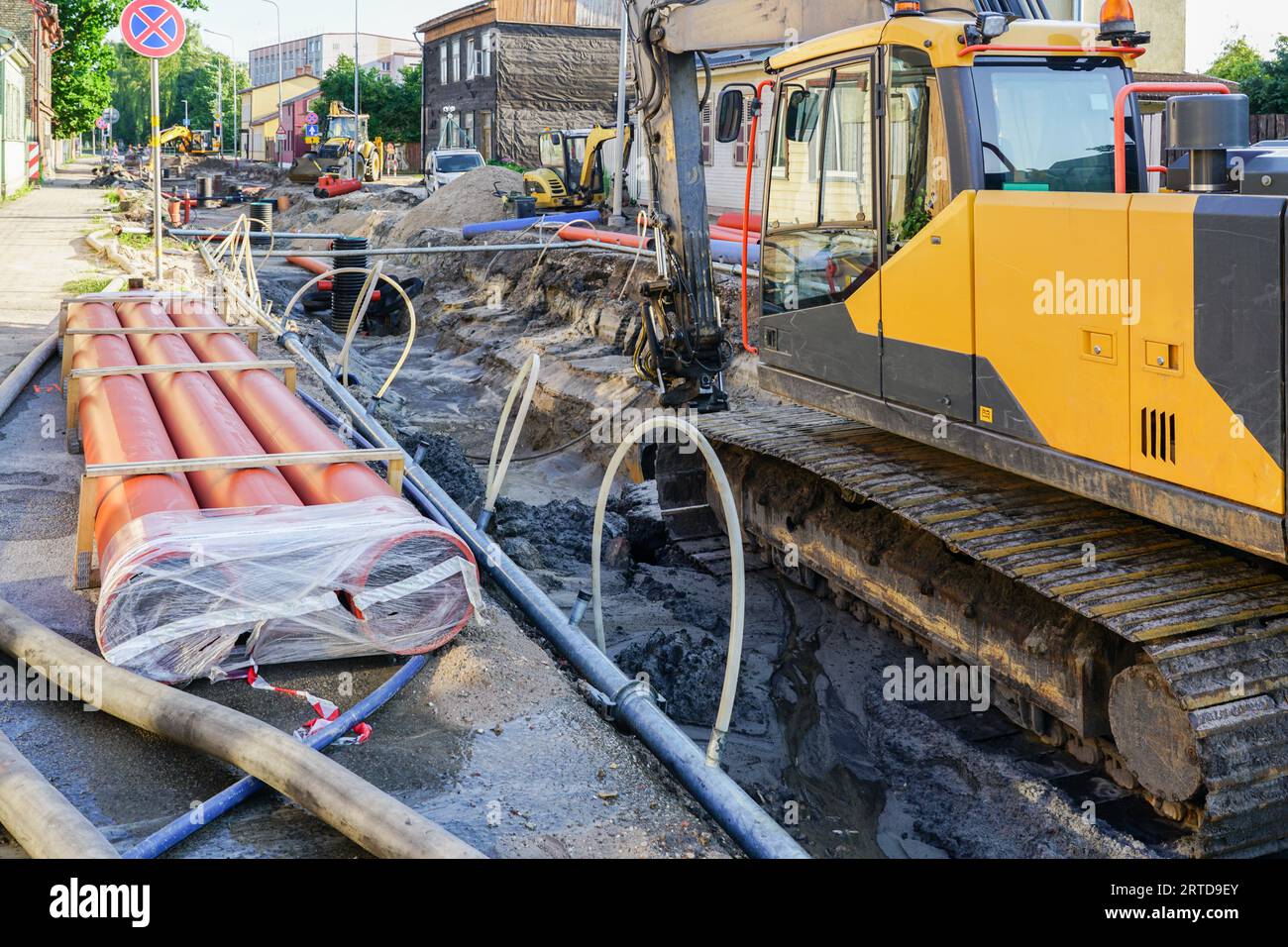 Street reconstruction view, deep and wide trench, replaced pipes and ...
