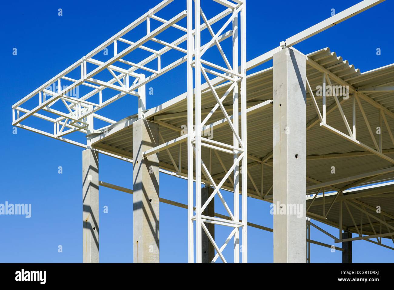 Unfinished commercial building steel and concrete frame facade fragment ...